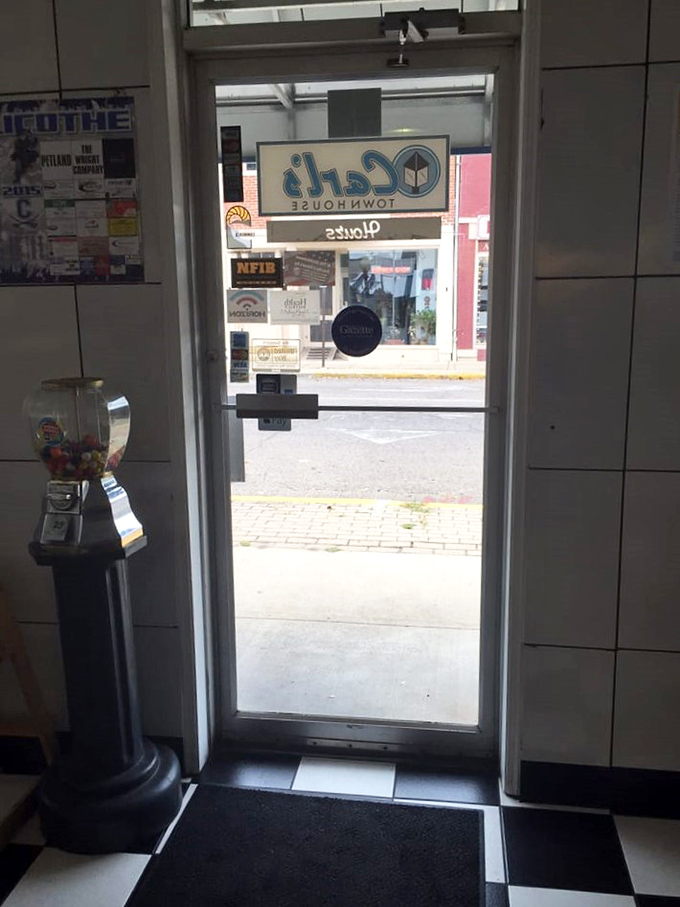 That entrance view feels like peering through a portal to simpler times, when a good meal didn't require a reservation made three weeks in advance.