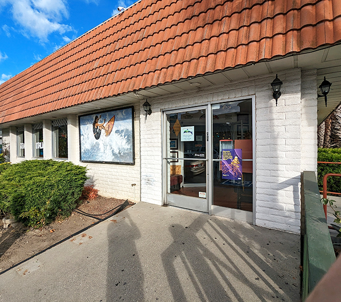 The entrance beckons with surfing murals and California sunshine &ndash; a portal to a world where calories don't count and coffee cups never empty.