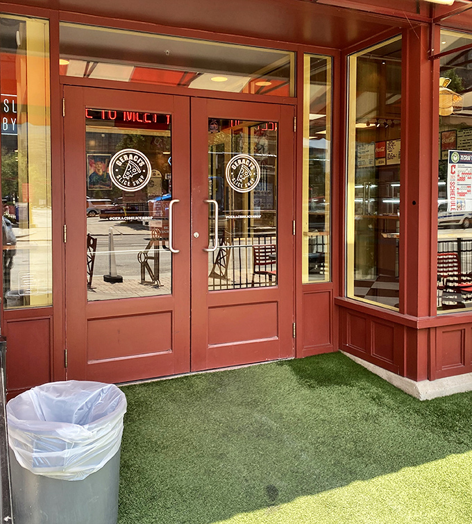 Red doors with the Geraci's logo&mdash;like the wardrobe to Narnia, except instead of a lion, you'll find magnificent pizza.