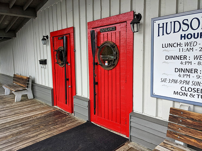 Twin red doors mark the spot where hunger meets happiness &ndash; no secret handshake required.