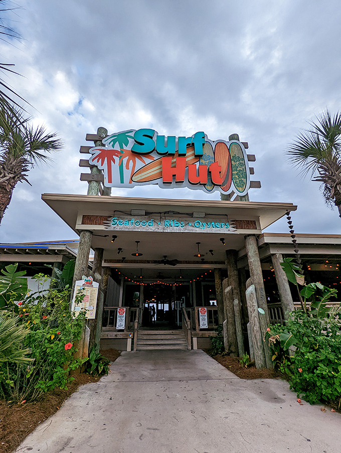 The sign promises seafood, ribs, and oysters, but what it really delivers is the coastal vacation vibe we all desperately need right now.
