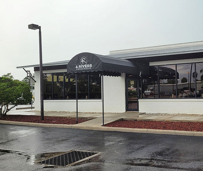 The awning and white brick exterior create that "should we go in?" moment. Spoiler alert: the answer is always, unequivocally, yes.