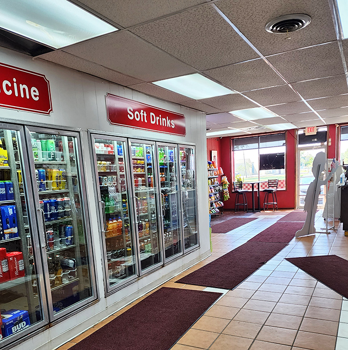 The "Pick-Up Here" sign might as well say "Happiness Collection Point." Digital menus bring modern efficiency to timeless flavors.