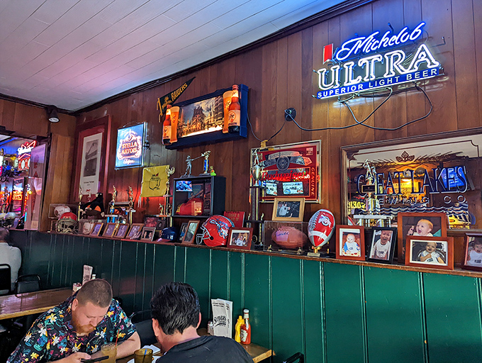 Sports memorabilia and cherished photos line the walls, telling the story of a place that's as much community living room as it is restaurant.