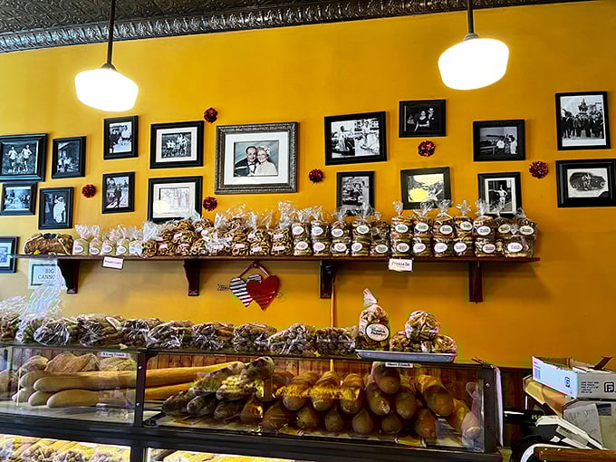 Family photos line the walls above packaged treats. Every picture tells a story, and every cookie continues the tradition.