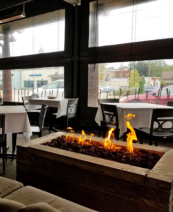 A fireplace that transforms ordinary Tuesday dinners into special occasions, proving flames aren't just for cooking&mdash;they're for ambiance too.