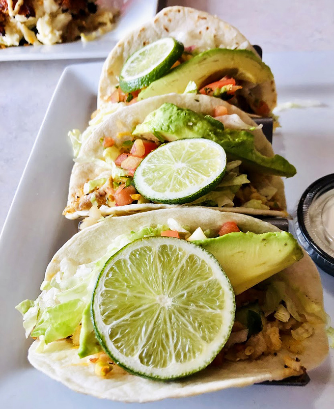 Fish tacos that transport you straight to a coastal vacation, with lime wedges standing by like zesty little life preservers.