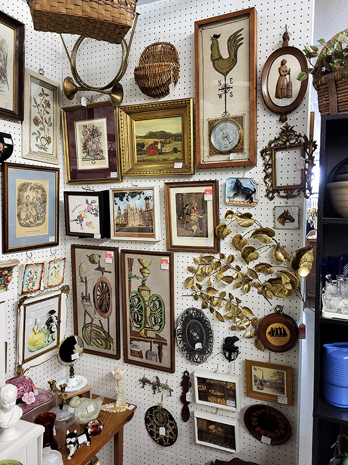 Wall art arranged with the chaotic precision of a history professor's office—each frame a window into someone else's memories.