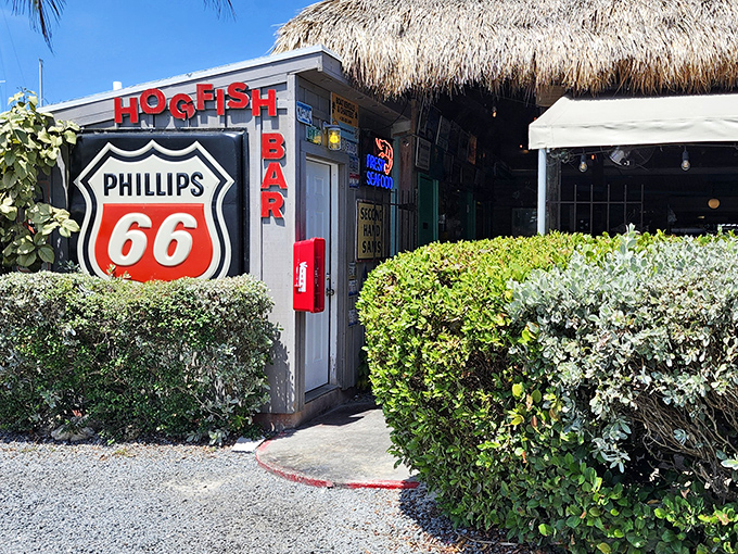 The unassuming entrance with its Phillips 66 sign and thatched roof is the culinary equivalent of "don't judge a book by its cover."