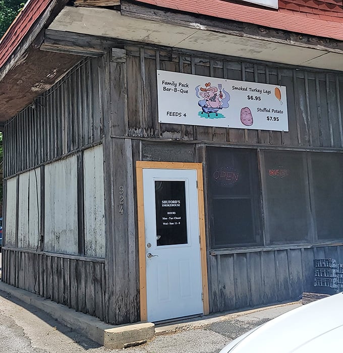 The sign says it all&mdash;family packs that feed four hungry souls. In BBQ math, that's approximately two teenagers or one linebacker.