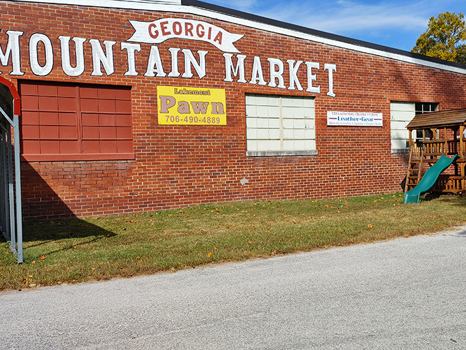 The market's exterior proudly announces its purpose to passing cars. That pawn shop sign hints at even more treasures waiting to be discovered.