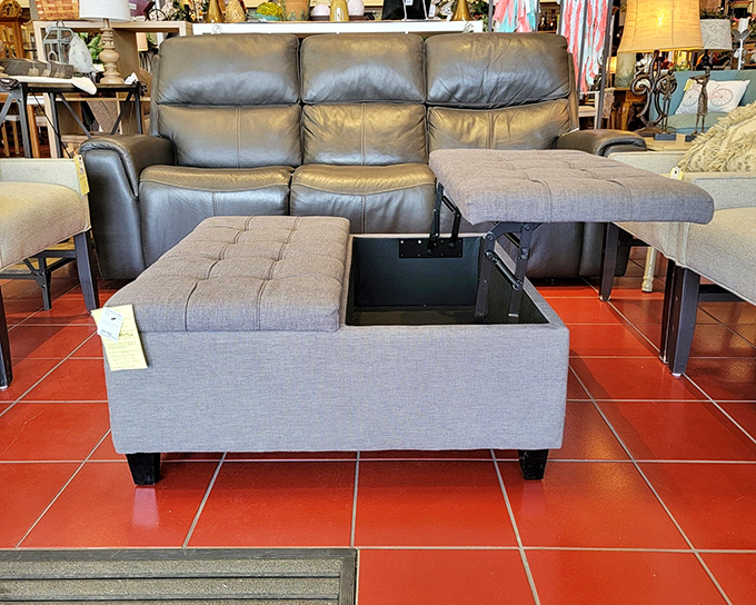 Leather meets linen in this furniture showcase. That clever storage ottoman hides magazines, remotes, or evidence of your afternoon snack habit.