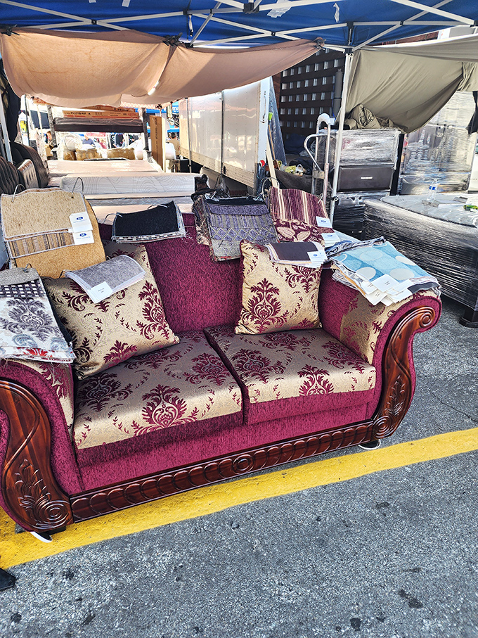 A regal sofa awaits its forever home. This burgundy beauty could transform your living room from "meh" to "magnificent" for a fraction of retail.