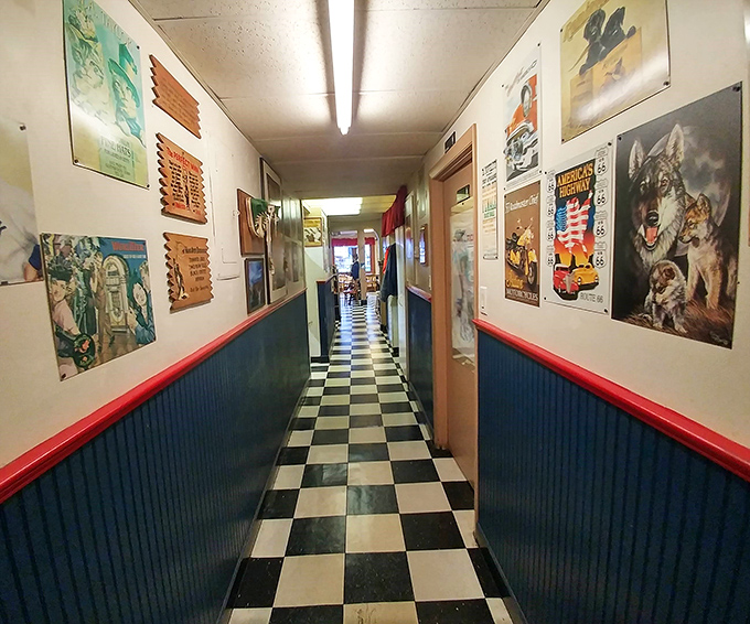 The checkered-floor hallway feels like a time portal to when restaurants weren't trying to be your Instagram backdrop—just your reliable comfort zone.