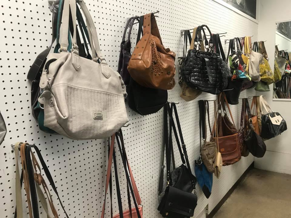 Handbag heaven on pegboard paradise&mdash;leather treasures waiting to be rediscovered and given second acts as fashion statements.