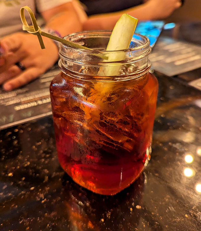 Sweet tea served in a proper mason jar, because some traditions are too perfect to change.