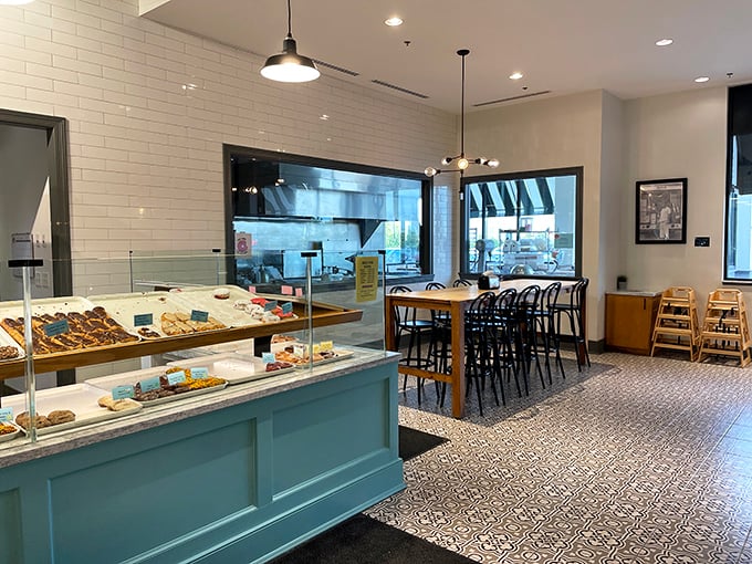 Clean lines, warm wood, and patterned floors create the perfect backdrop for the main event: deciding which donut deserves your devotion.