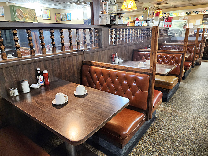 Wood paneling and tufted booths—not because they're retro-chic, but because they never stopped being exactly right.