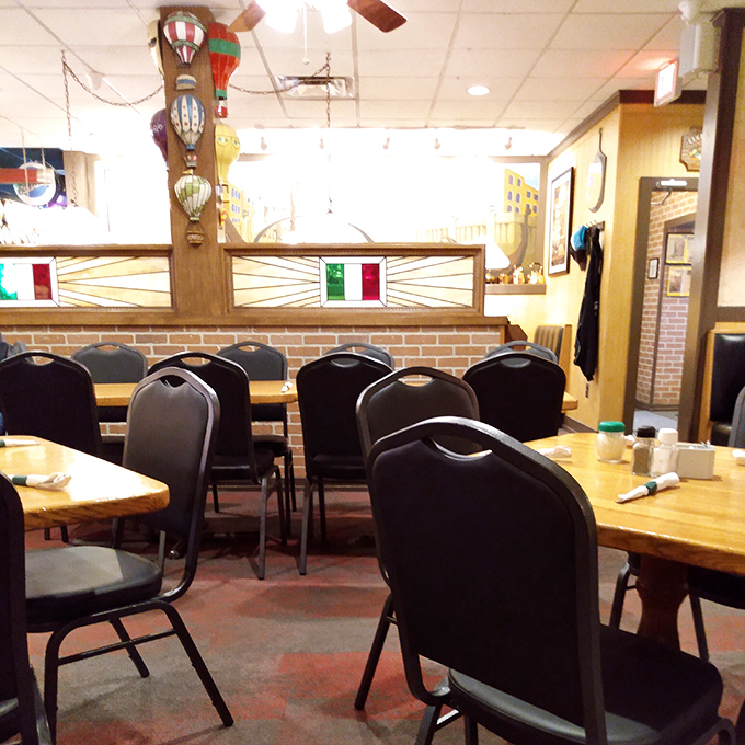 Italian flags and miniature hot air balloons add whimsy to the dining room. These tables have hosted everything from first dates to "we need to talk" conversations.