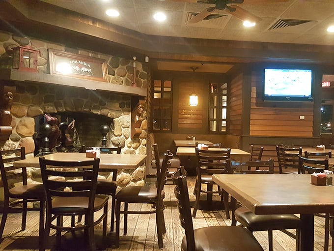Stone fireplace, wooden accents, and comfortable seating create that "Up North" feeling without the three-hour drive from Detroit.