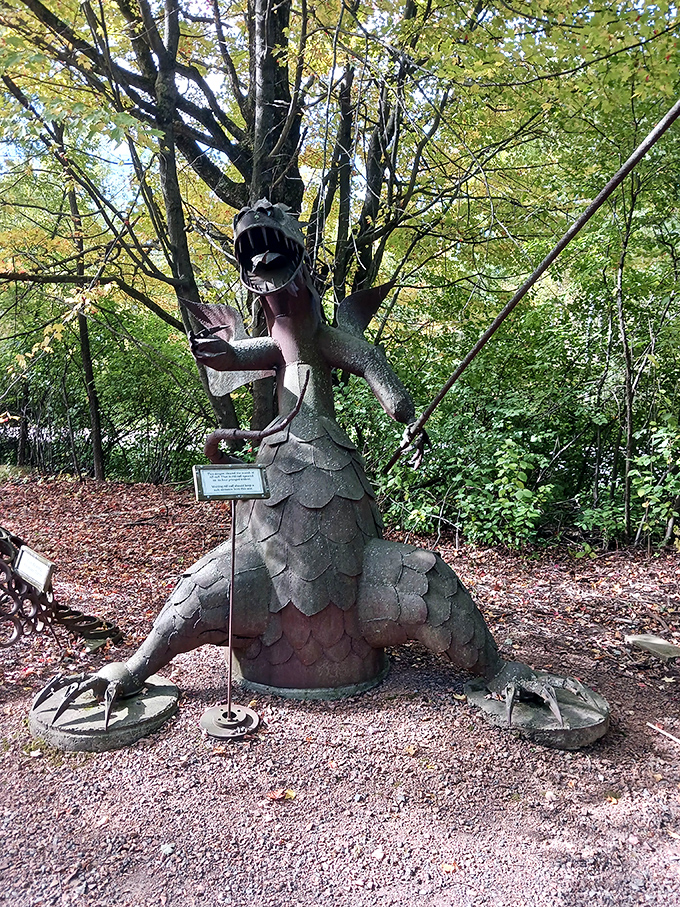 With jaws agape and eyes wide, this expressive dragon sculpture captures the perfect balance between fearsome and fantastical.