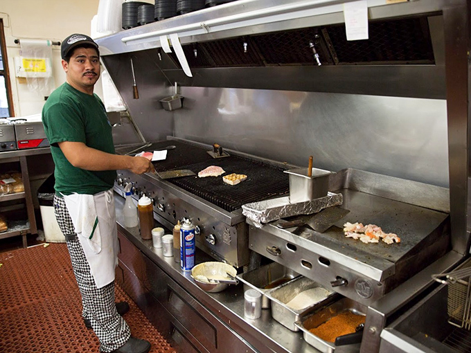 Where the magic happens&mdash;a glimpse into the kitchen where simplicity and skill transform fresh catches into memorable meals.