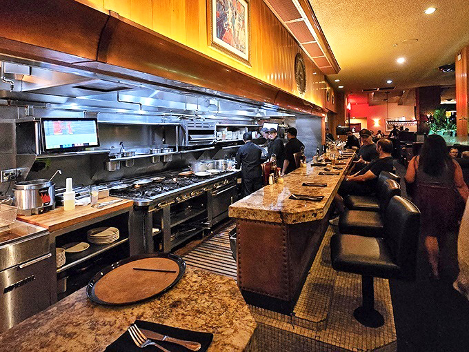 The open kitchen isn't just for show&mdash;it's dinner and a performance where chefs orchestrate culinary magic with the precision of seasoned conductors.