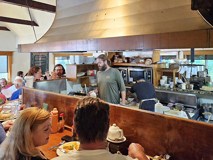 An open kitchen where breakfast magic happens. No smoke and mirrors&mdash;just skilled hands turning simple ingredients into morning masterpieces.