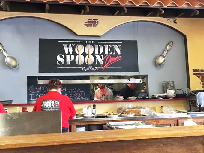 Where the magic happens: The open kitchen design lets you witness the choreographed dance of breakfast preparation in all its sizzling glory.