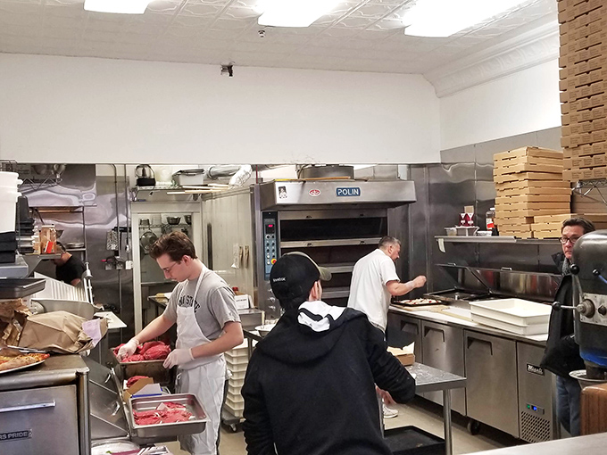 The kitchen at Angelo's operates with the precision of a Swiss watch. Every movement has purpose, every action brings you closer to sandwich nirvana.