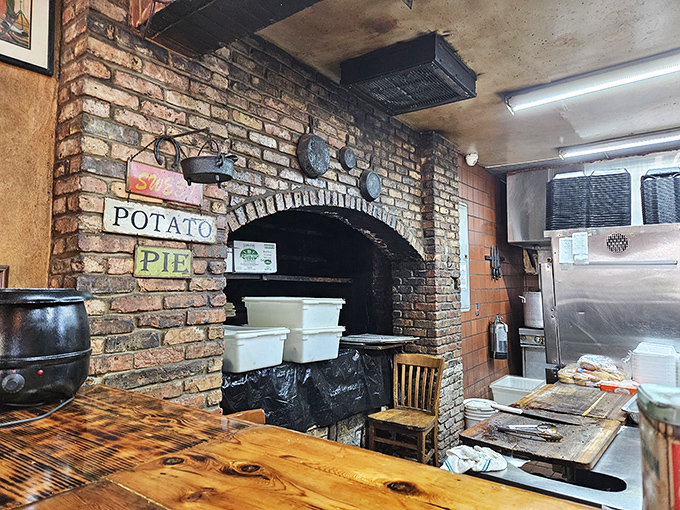 The brick hearth&mdash;a barbecue altar where smoke and time transform the ordinary into the extraordinary. This is where the magic happens.
