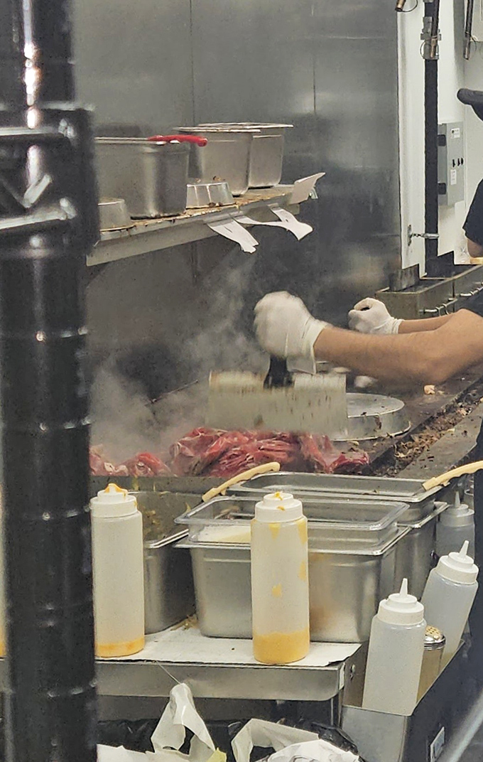 Where the magic happens. That sizzling griddle transforms simple ingredients into the stuff of sandwich legend before your very eyes.