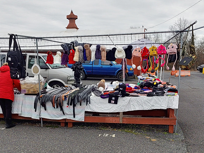 A rainbow of knitted hats dangles like colorful stalactites. In Pennsylvania winters, practical fashion isn't just smart &ndash; it's survival with style.