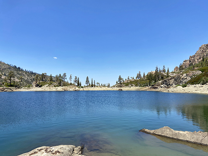 Blue perfection that no swimming pool designer could ever replicate. This alpine lake offers crystal clarity that seems almost otherworldly.