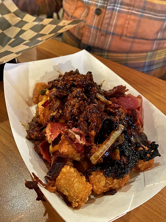 When bar food ascends to art form. These loaded tots aren't just a side&mdash;they're the main event, crowned with savory toppings and melty goodness.