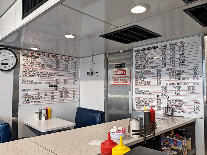 The full menu spread across the wall like a roadmap to satisfaction. No QR codes or daily specials&mdash;just reliable classics.