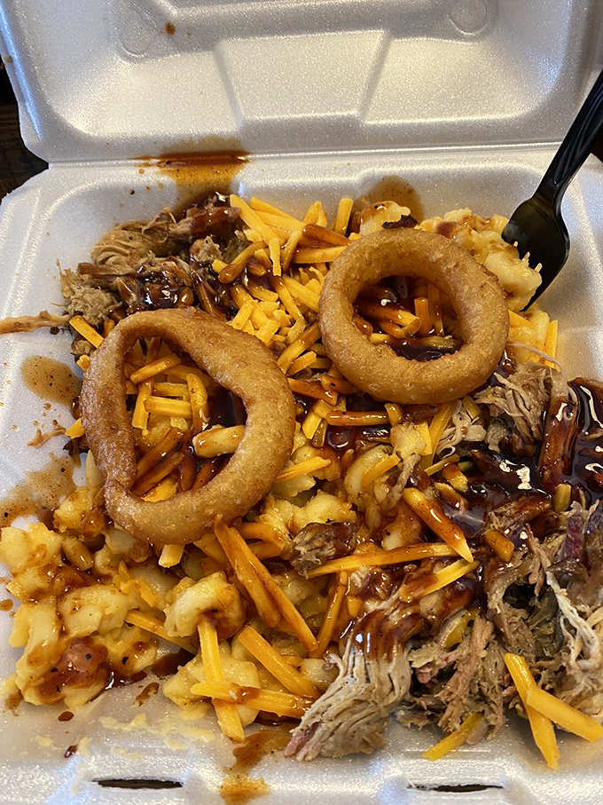 The legendary Mess Plate lives up to its name in the most glorious way&mdash;pulled pork, mac and cheese, and onion rings in beautiful, delicious chaos.