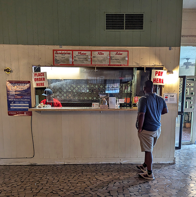 The ordering counter&mdash;that magical threshold where dreams of perfect barbecue begin their journey to delicious reality.