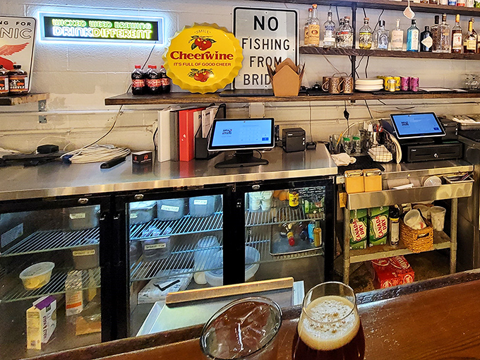 Cheerwine signs and "No Fishing From Bridge" warnings - you're not just in a restaurant, you're in the heart of North Carolina, one beer at a time.