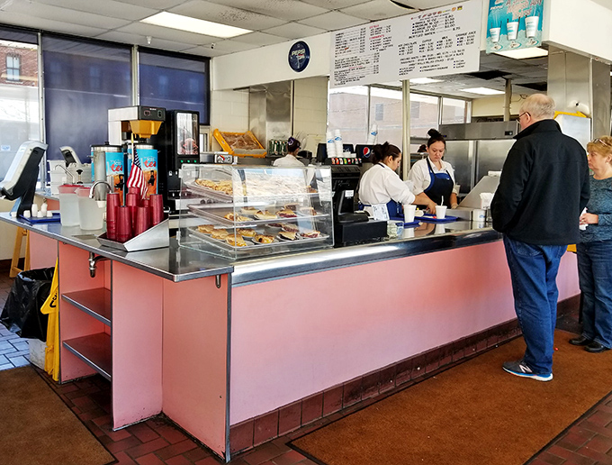 The order counter&mdash;where dreams come true and diet plans go to die. Worth every delicious calorie.