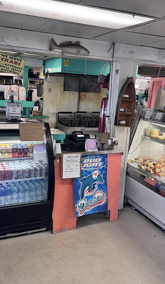 The order counter where dreams of fried seafood become reality&mdash;efficiency over elegance, and nobody's complaining about it.
