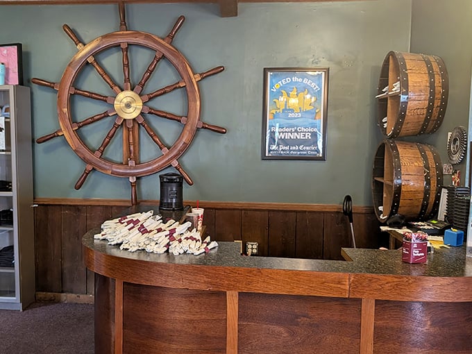 The ship's wheel marks the spot where culinary treasures await. Like a maritime-themed North Star guiding hungry travelers home.