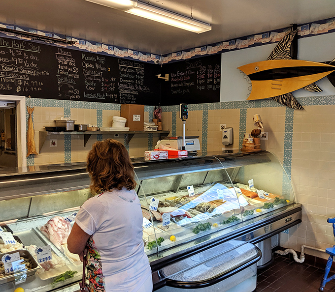 The seafood market section&mdash;where glass cases display the morning's catch like jewels in an oceanic treasure chest.