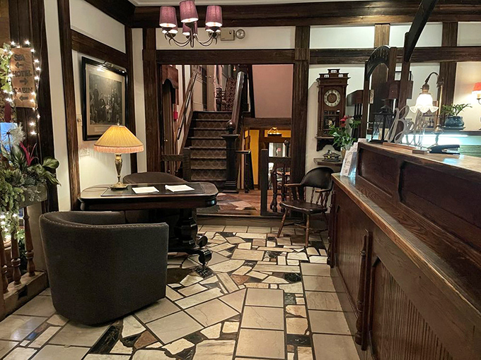 The entryway feels like walking into someone's very elegant home&mdash;if that someone had impeccable taste and a fondness for ambient lighting.