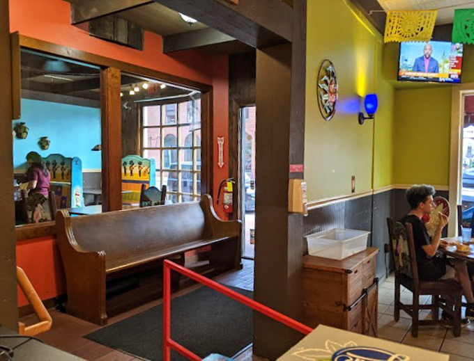 The church of comfort food where wooden pews are replaced with chairs and stained glass with colorful walls&mdash;equally sacred.