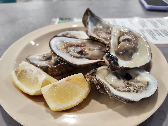 Oysters: the ocean's perfect little packages of briny delight. Add lemon and suddenly you're the sophisticated diner you always claimed to be.