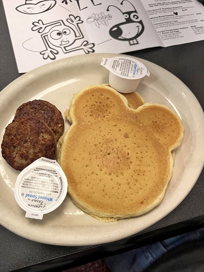Mickey has nothing on this pancake. Golden-brown, perfectly round, and waiting for its maple syrup bath&mdash;childhood joy on a plate. 