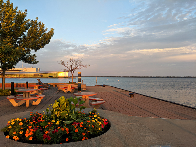 Sunset transforms this lakeside picnic area into nature's dining room, where the view competes with whatever you've packed in your basket.