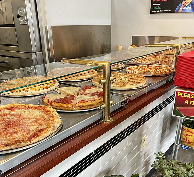 Pizza paradise on display&mdash;where indecision isn't a problem but a delightful challenge you're willing to accept.