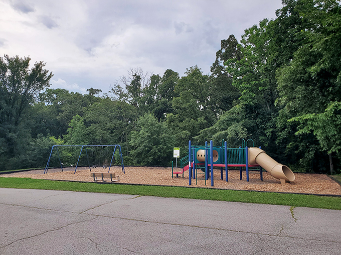 Even the playground sits quietly in nature's embrace, where kids can burn energy while parents recharge their own batteries.